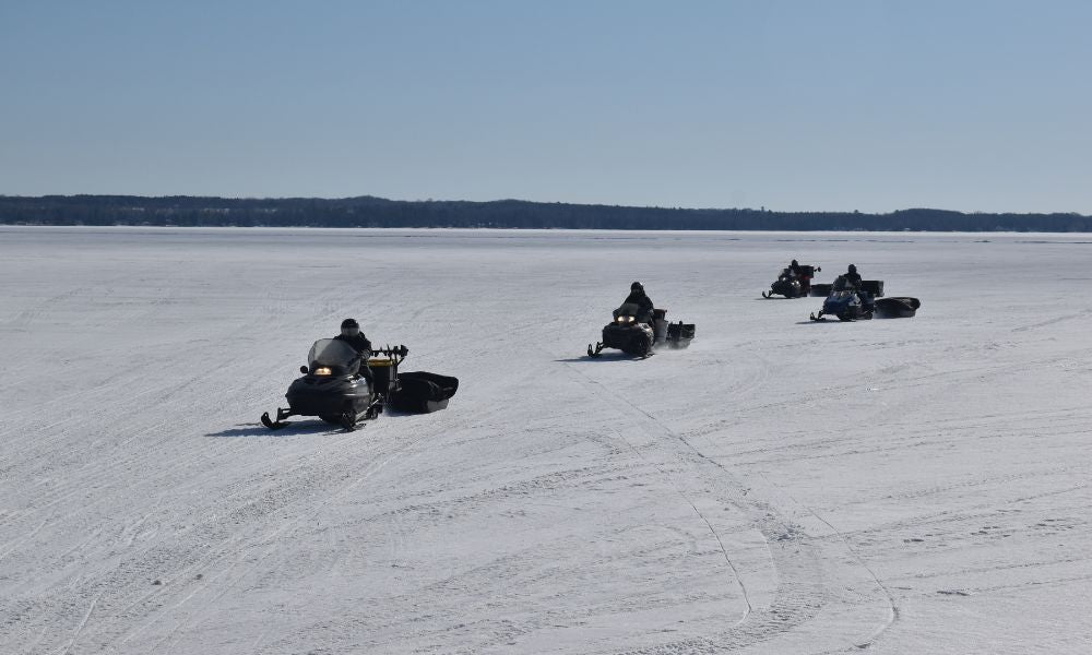 Staying Safe While Snowmobiling on Lakes and Ice | Peakboys